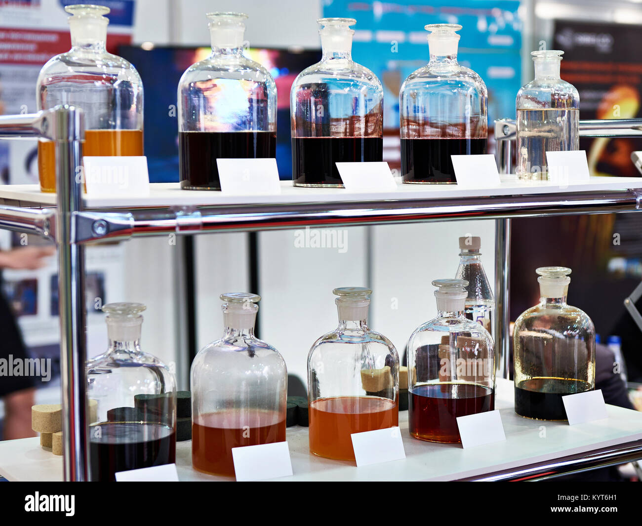 Chemical fluids on a shelf in an industrial laboratory Stock Photo - Alamy