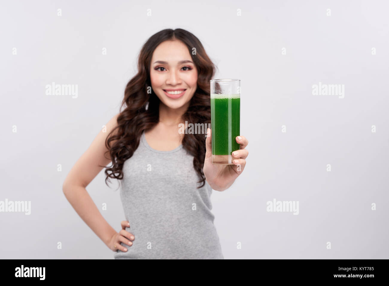 Healthy asian woman holding juice glass. Detox smoothie drink Stock ...