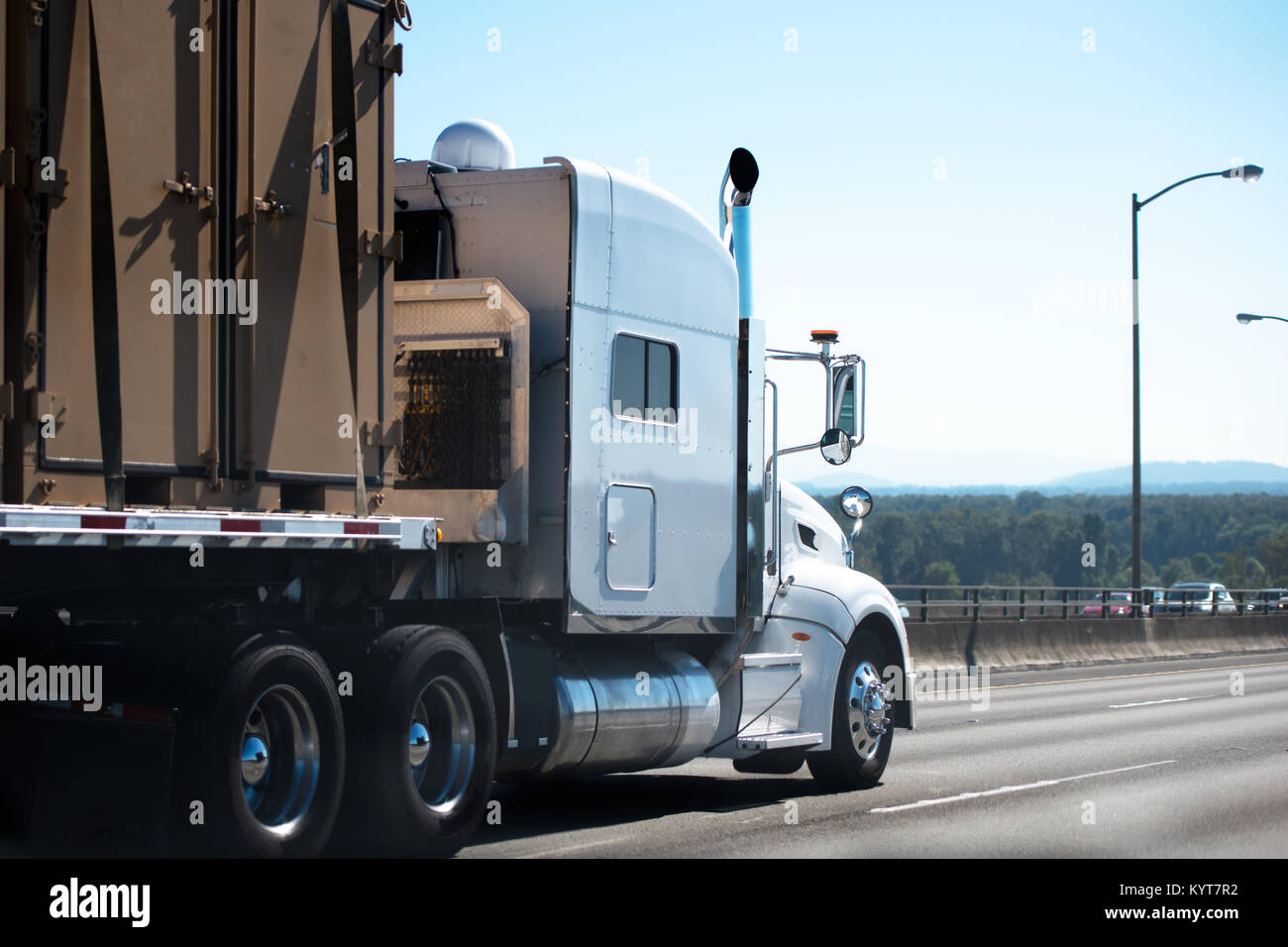 Powerful classic American big rig semi truck with high chrome pipes and ...