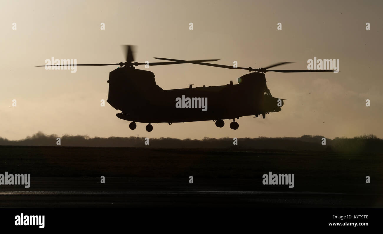 A Chinook helicopter takes off from RAF Odiham in Hampshire Stock Photo ...