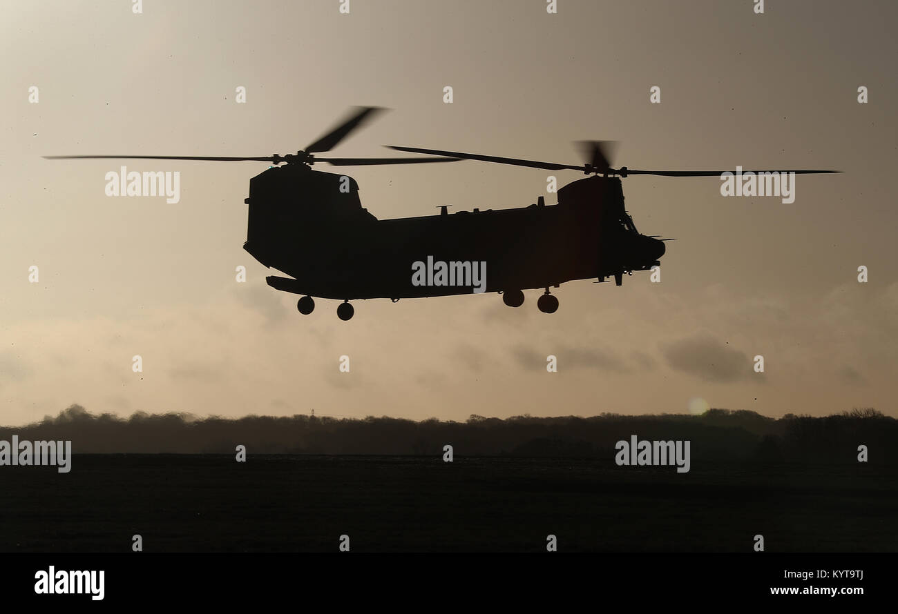 A Chinook helicopter takes off from RAF Odiham in Hampshire Stock Photo ...
