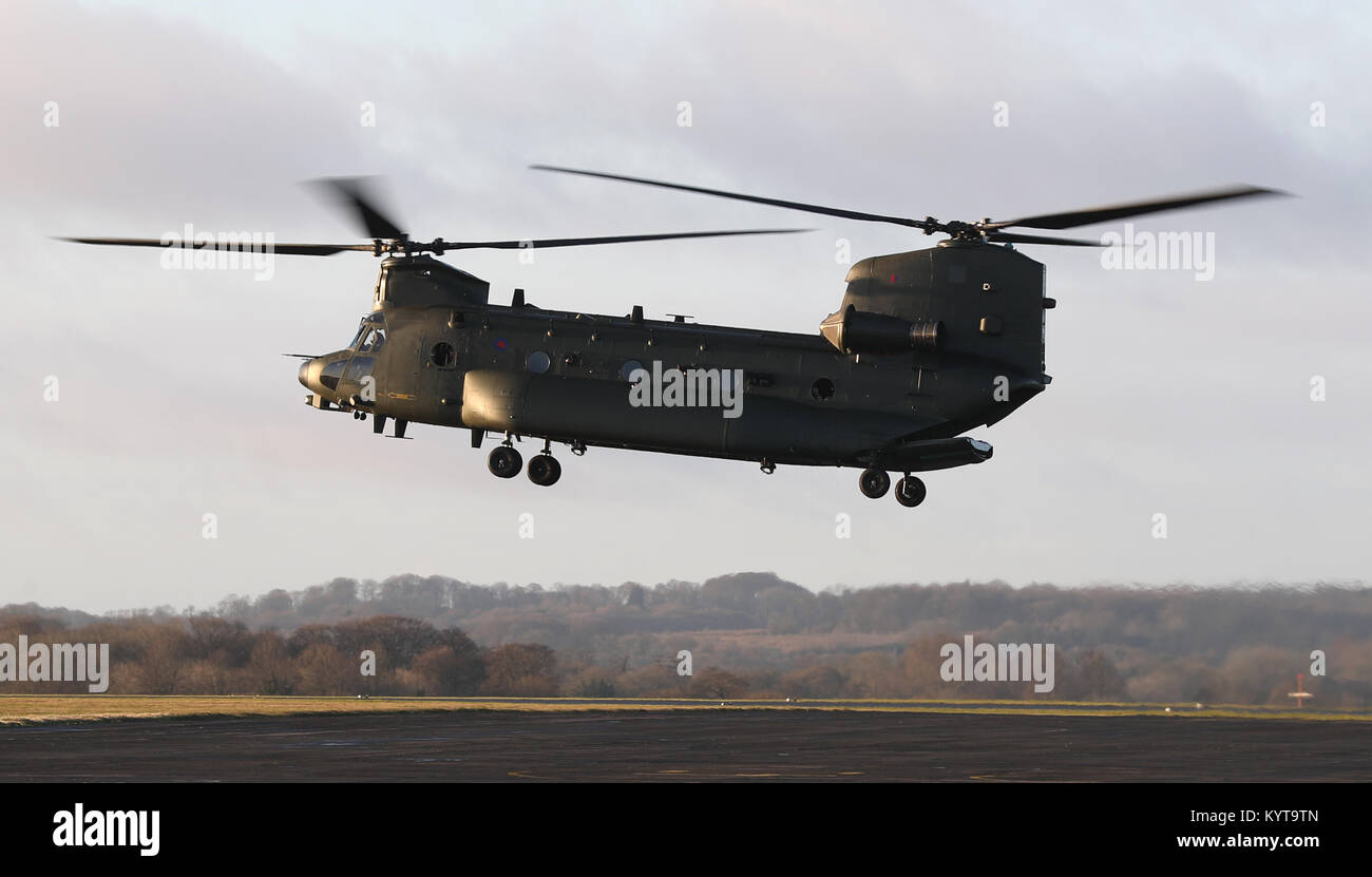 A Chinook helicopter takes off from RAF Odiham in Hampshire Stock Photo ...