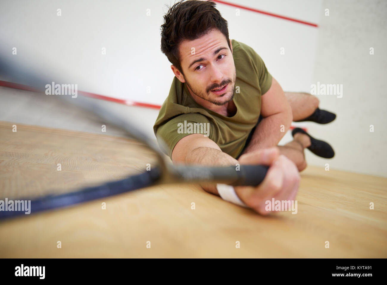 Player reaching for the squash ball Stock Photo - Alamy