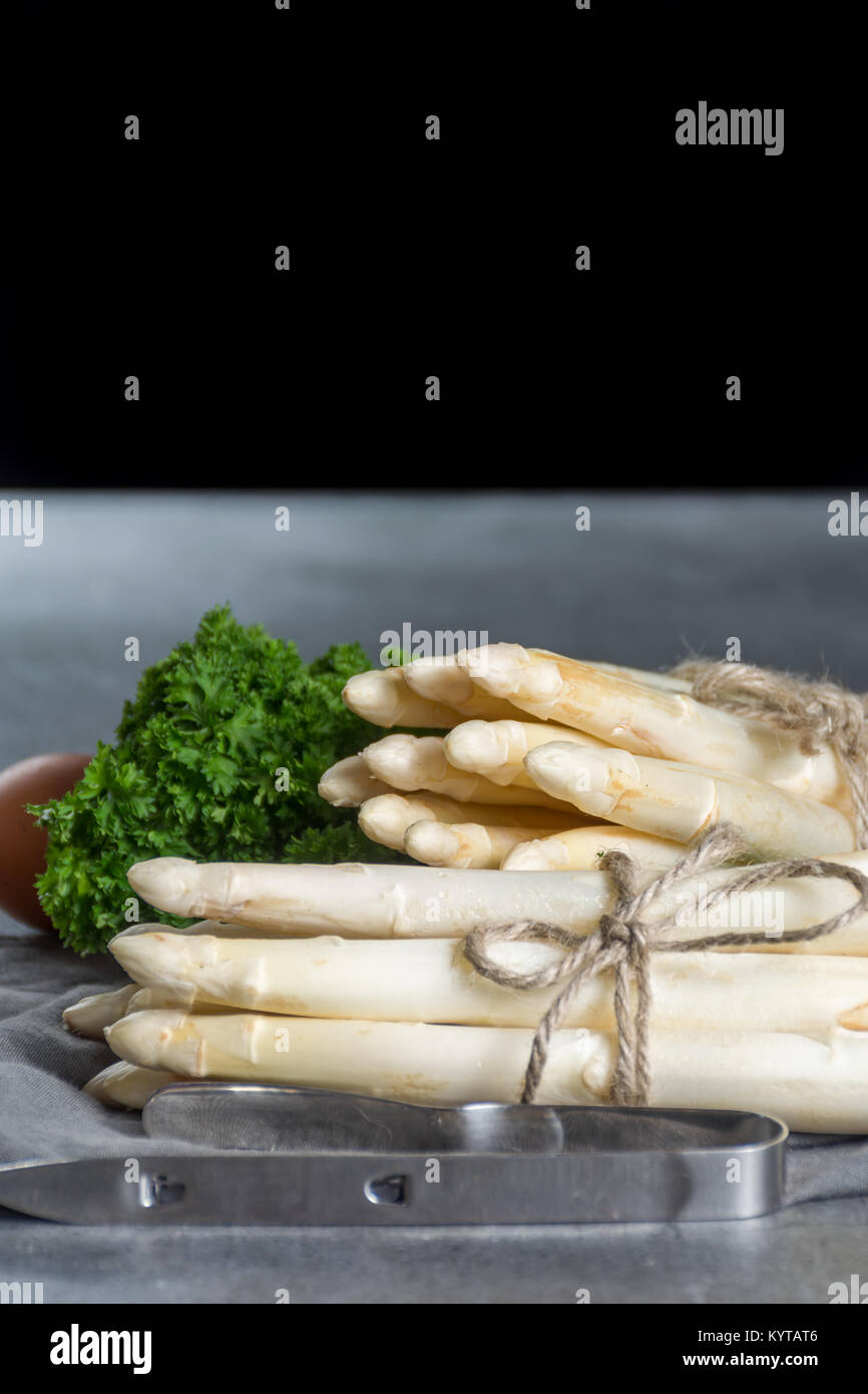 Spring season, new harvest of Dutch, German white asparagus, bunch of ...