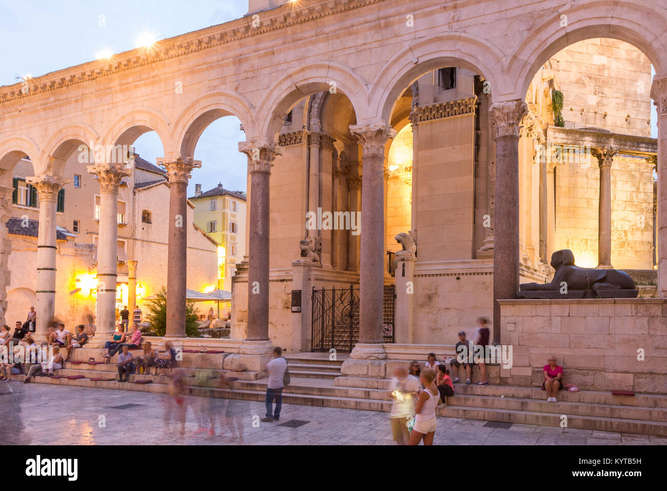 Tourists at the Diocletian's Palace's lit peristyle in Split, Croatia ...