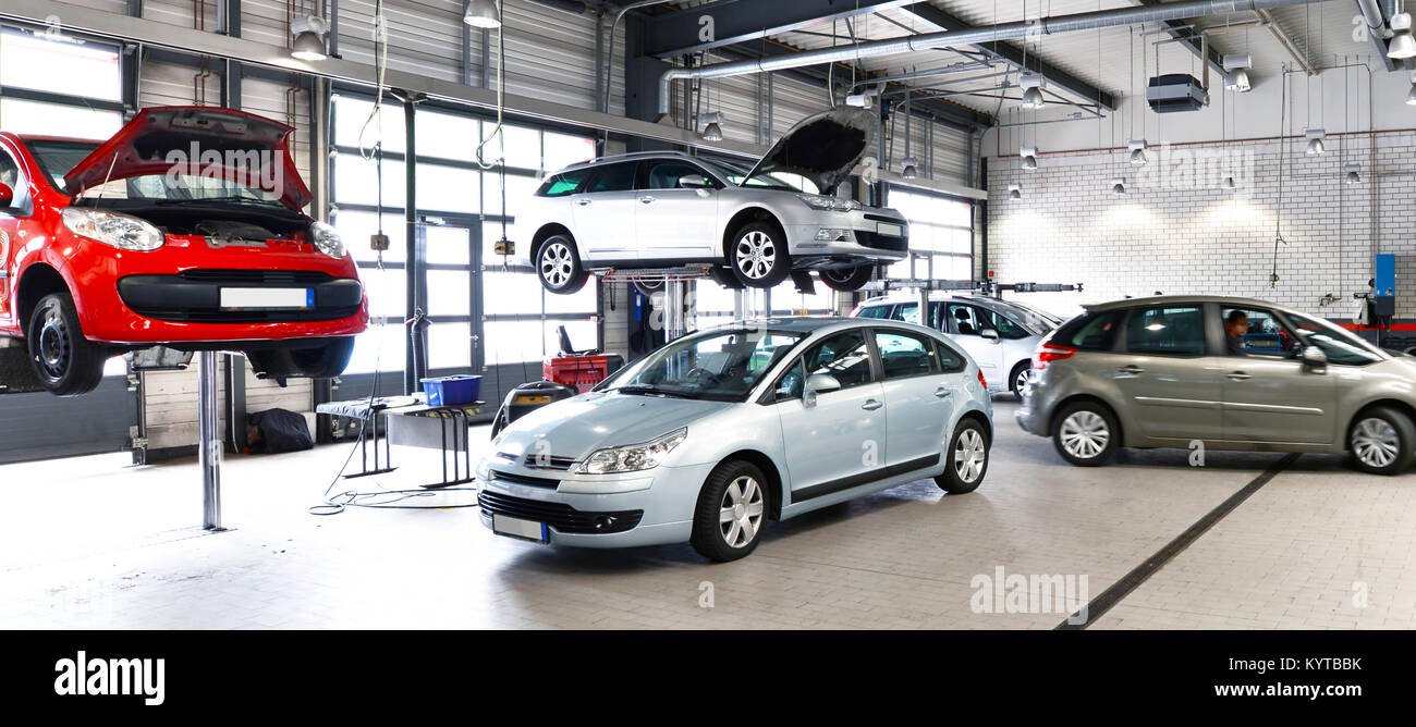 vehicles in a car repair shop for the repair with lifting platform ...