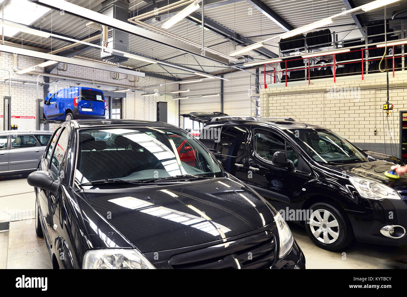 vehicles in a car repair shop for the repair with lifting platform ...