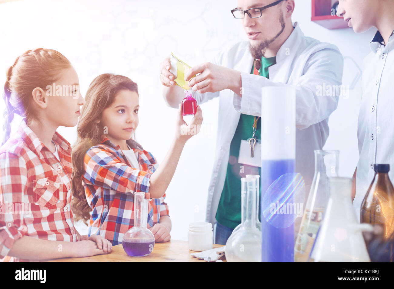 Need your help. Adorable future scientists helping their tutor and ...