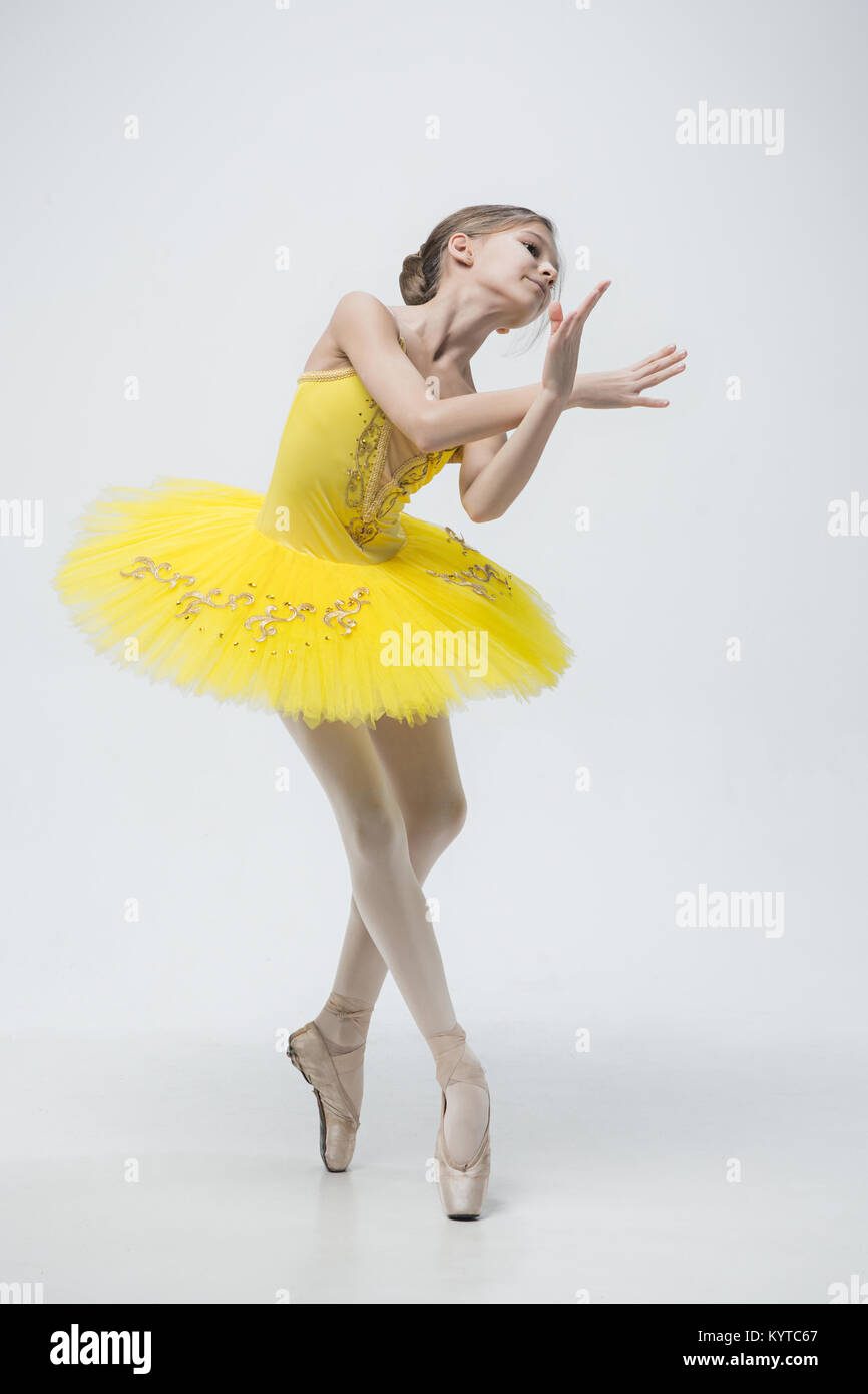 Young classical dancer on white background Stock Photo - Alamy