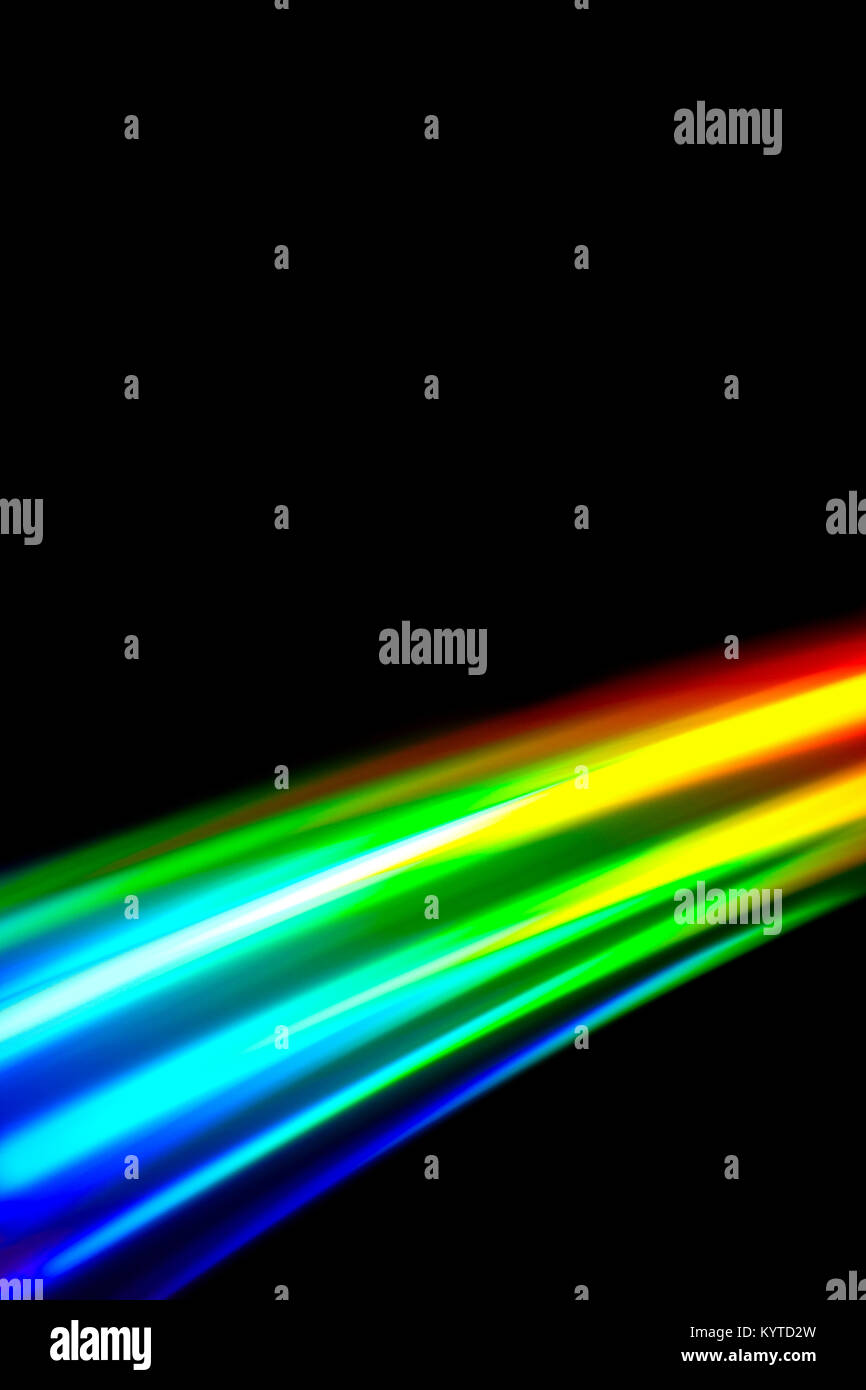 Beams of light refracting and creating a rainbow spectrum of colours ...