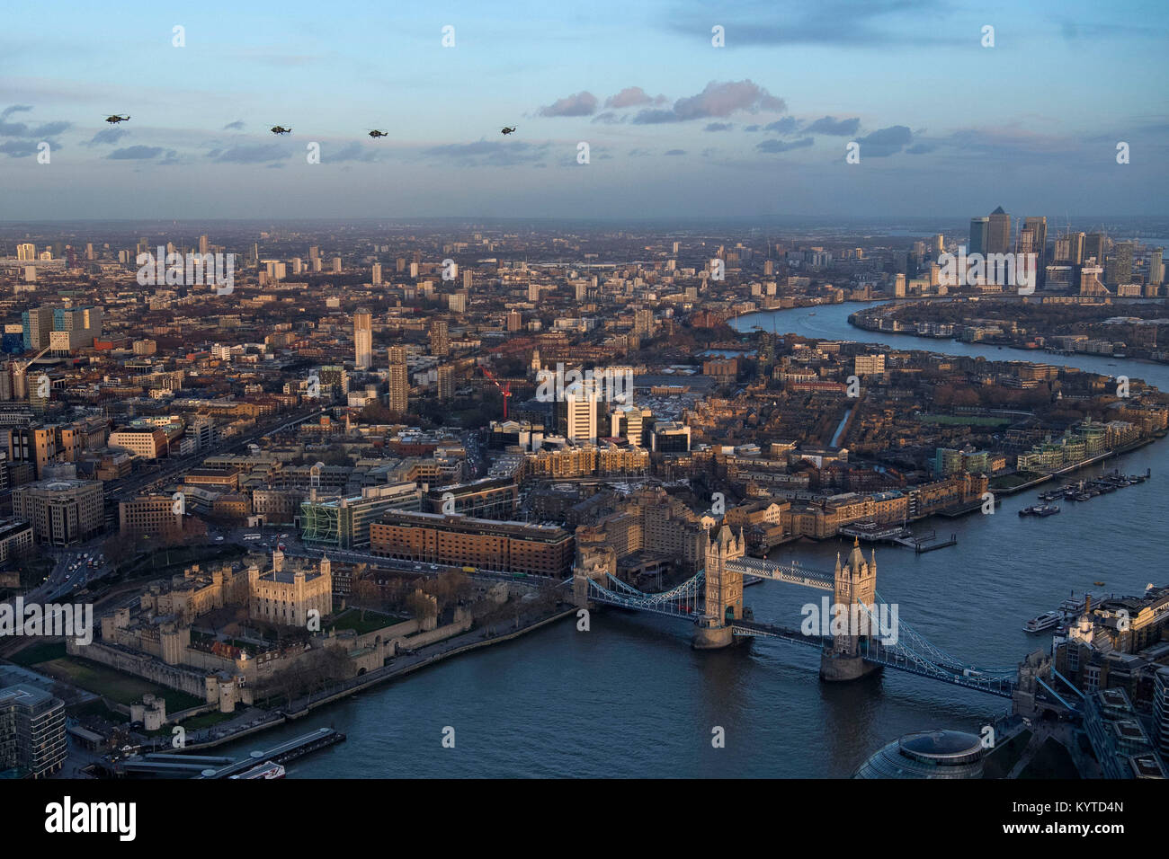 Four Lynx helicopters flying over Tower Bridge in London, as seen from ...