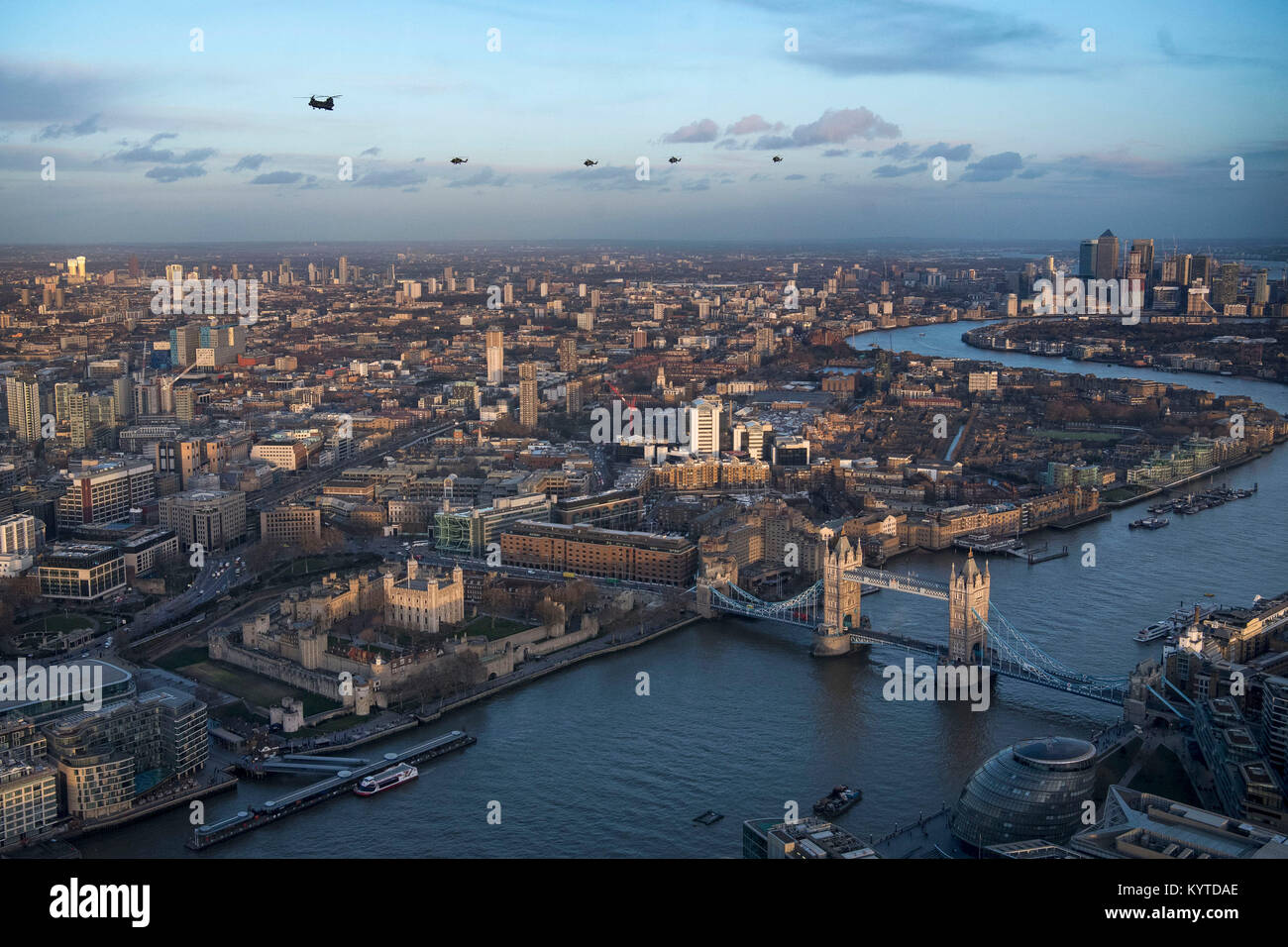 Four Lynx helicopters flying over Tower Bridge in London, as seen from ...