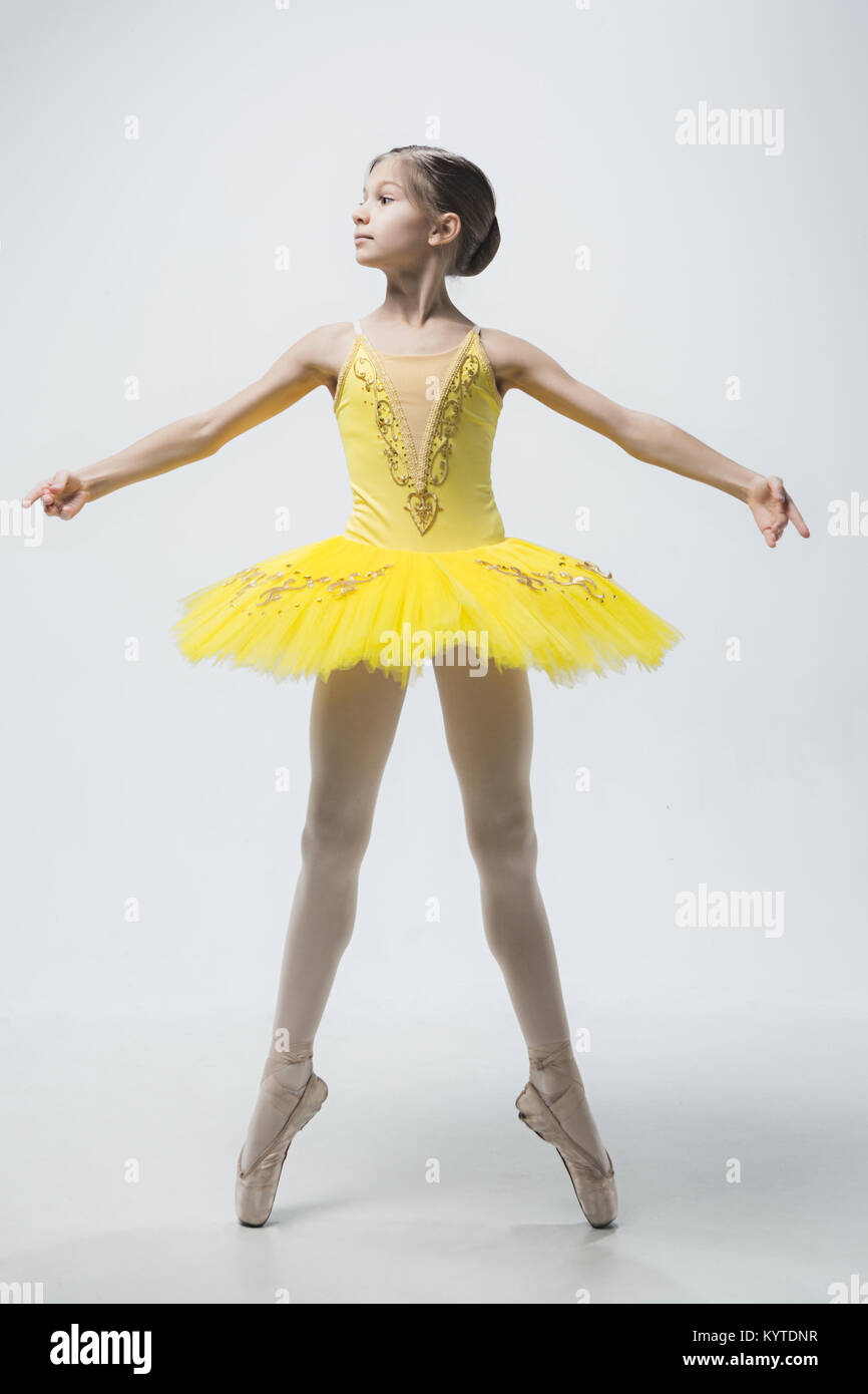 Young classical dancer on white background Stock Photo - Alamy