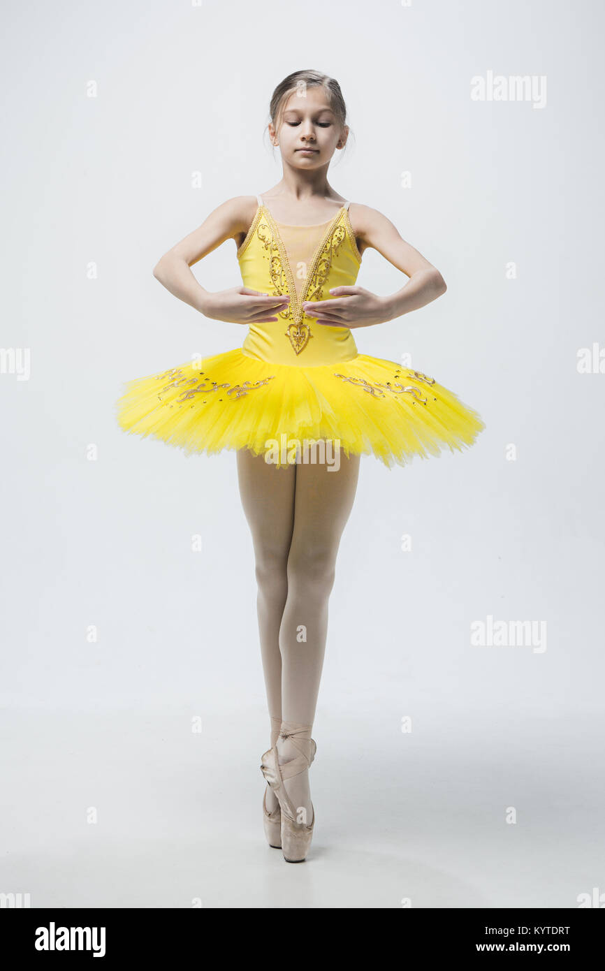 Young classical dancer on white background Stock Photo - Alamy