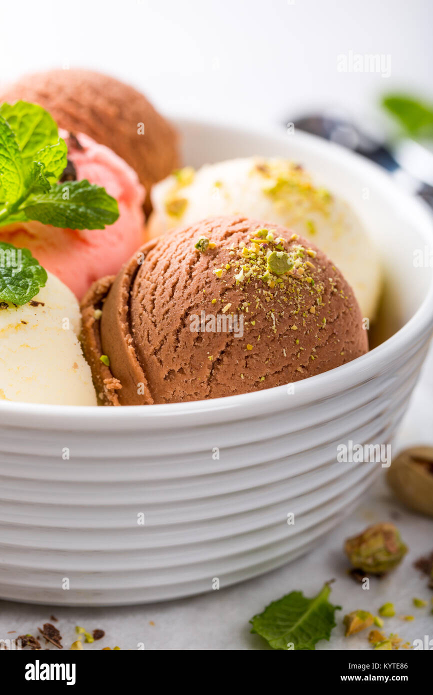 Assorted ice cream in white bowl Stock Photo - Alamy