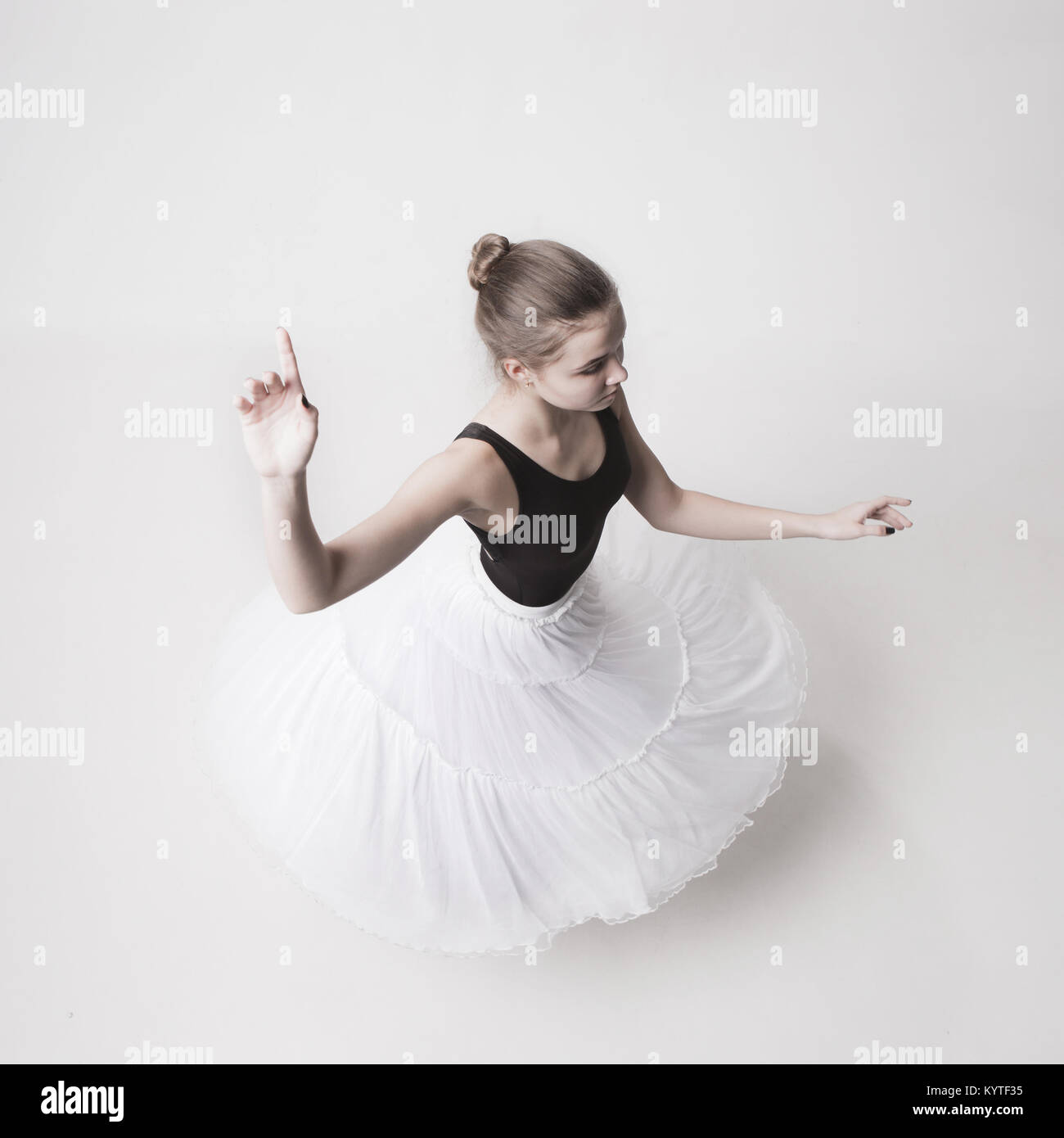 The top view of the teen ballerina on white background Stock Photo - Alamy