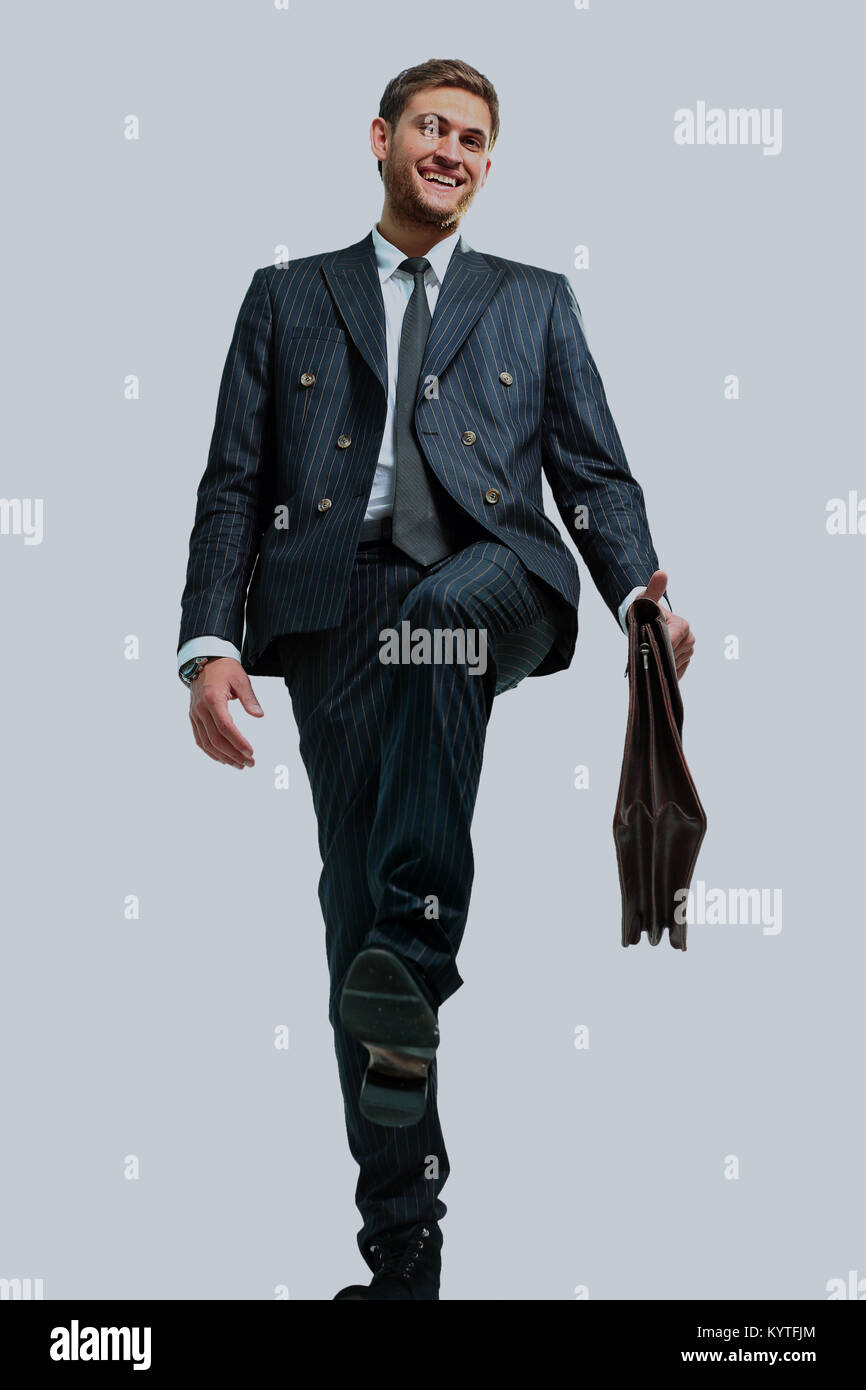 businessman makes a new step. standing at the top Stock Photo - Alamy