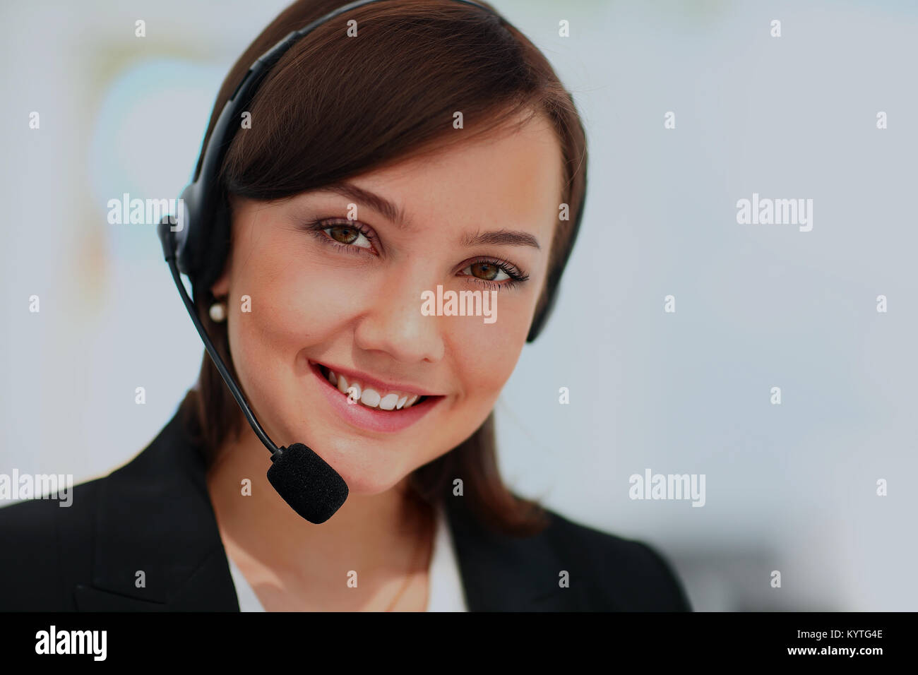 Portrait of happy smiling cheerful support phone operator Stock Photo ...