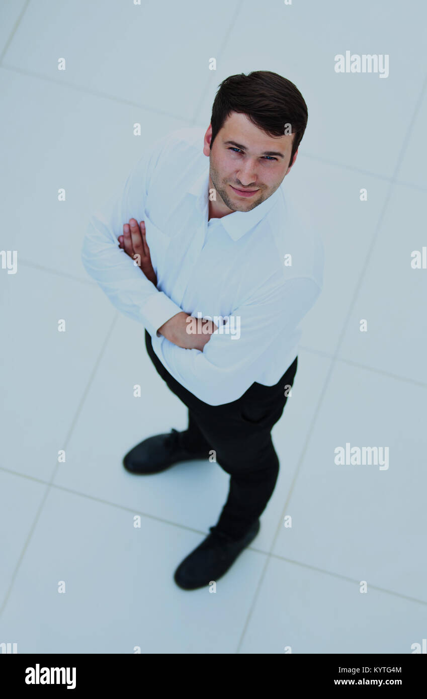 Portrait of a handsome elderly business man standing indoor Stock Photo ...