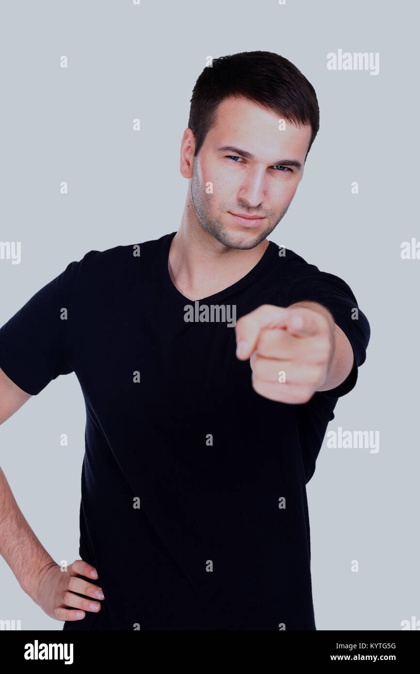 Young smiling man pointing at you Stock Photo - Alamy