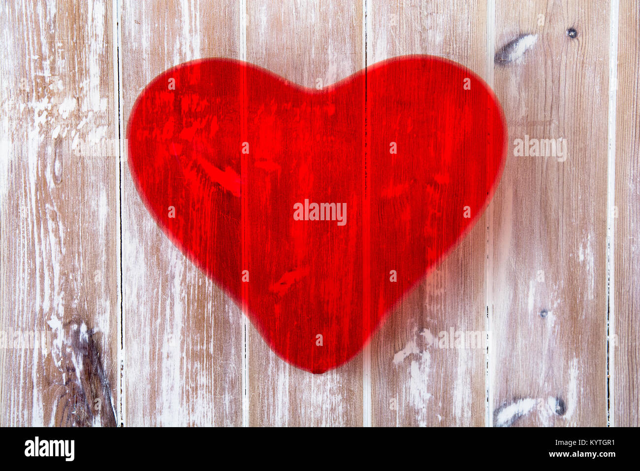 Valentines day love heart on rustic wood background Stock Photo - Alamy