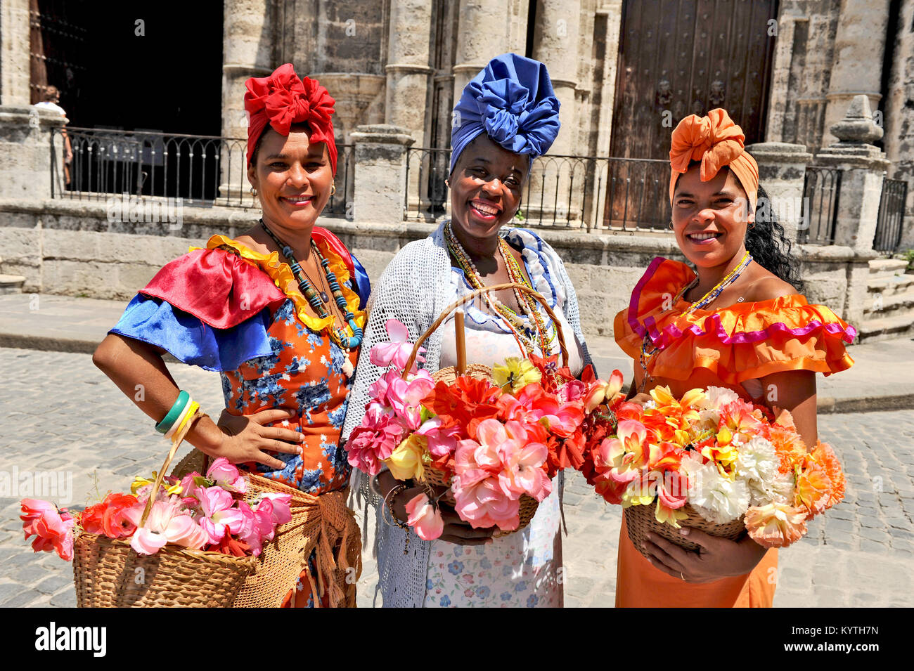 HAVANA, CUBA, MAY 6, 2009. Three Cuban women posing in traditional ...