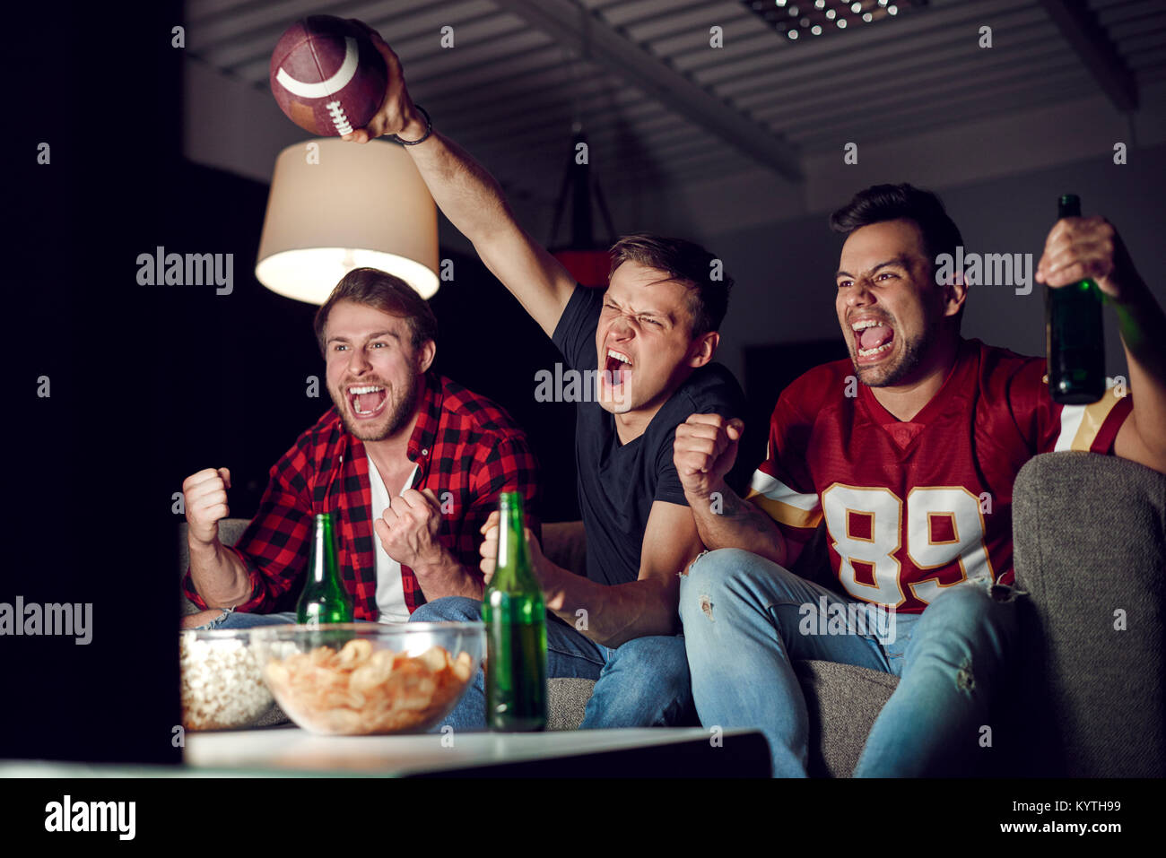 Football fans shouting and gesturing Stock Photo - Alamy