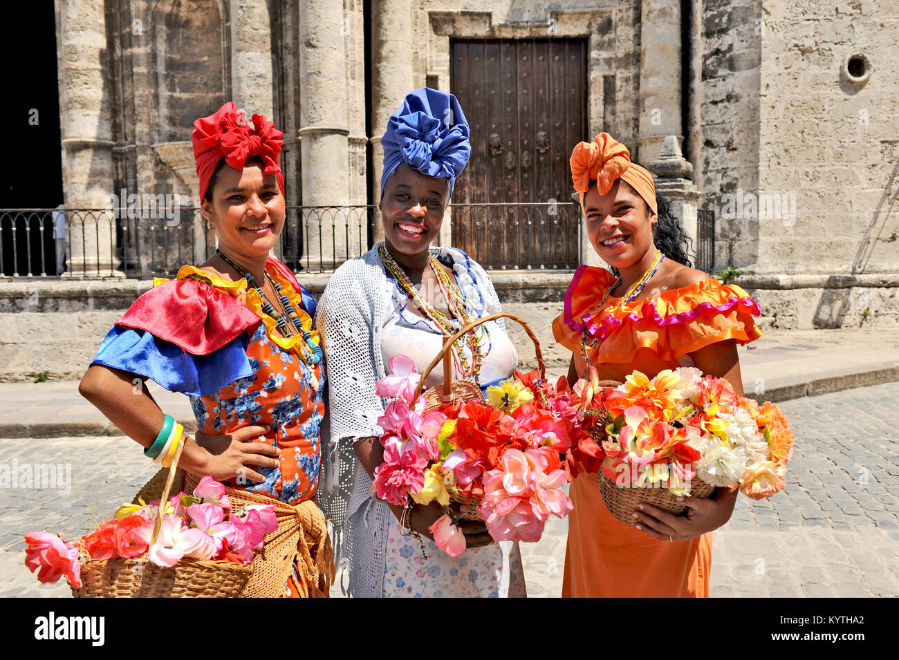 HAVANA, CUBA, MAY 6, 2009. Three Cuban women posing in traditional ...