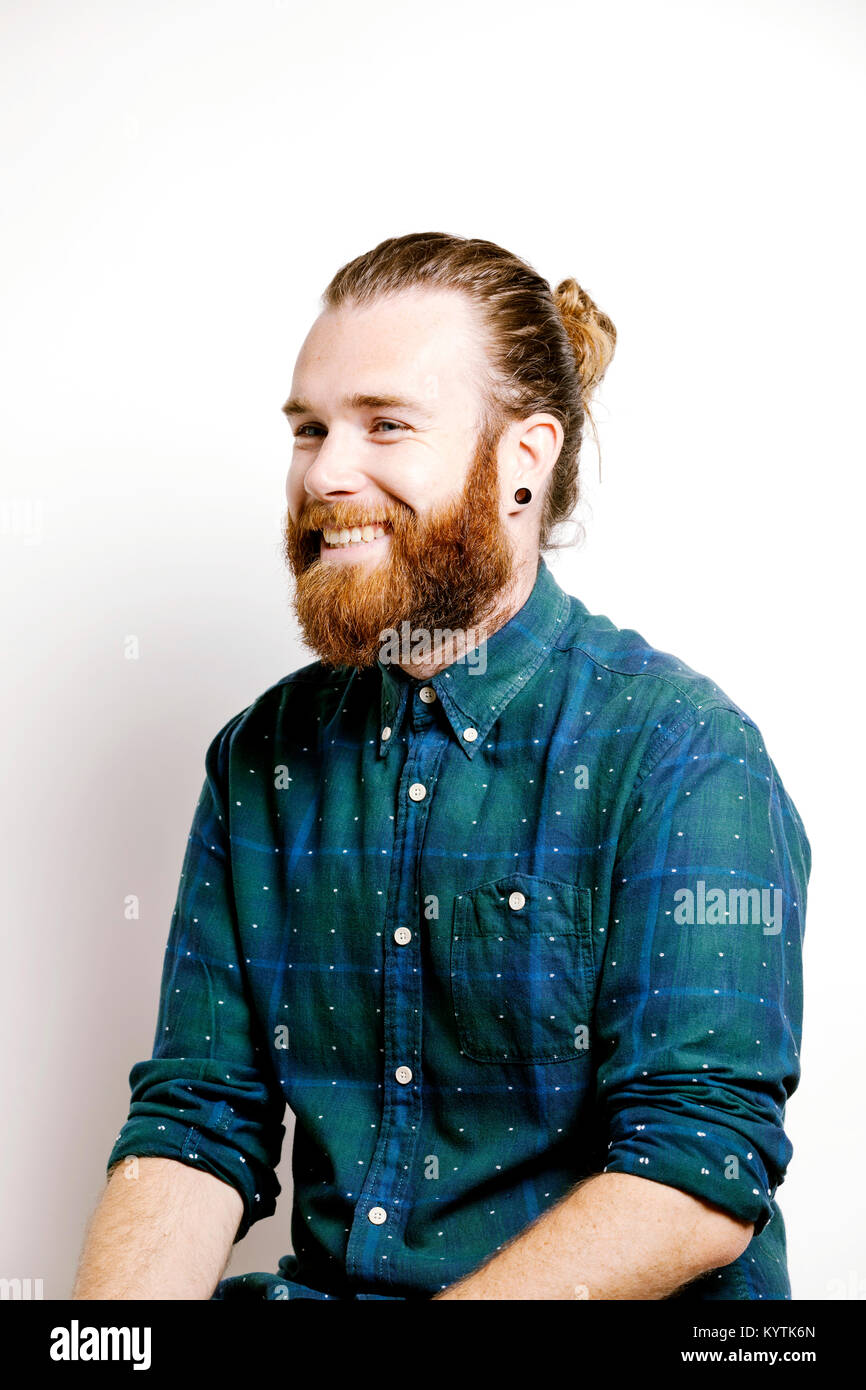 Male bearded friends sitting hi-res stock photography and images - Alamy