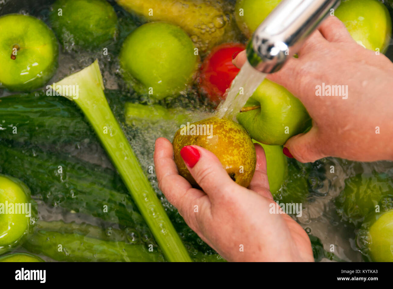 Washing fruit hi-res stock photography and images - Alamy