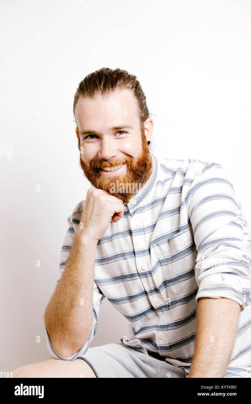 Portrait happy bearded young hi-res stock photography and images - Alamy