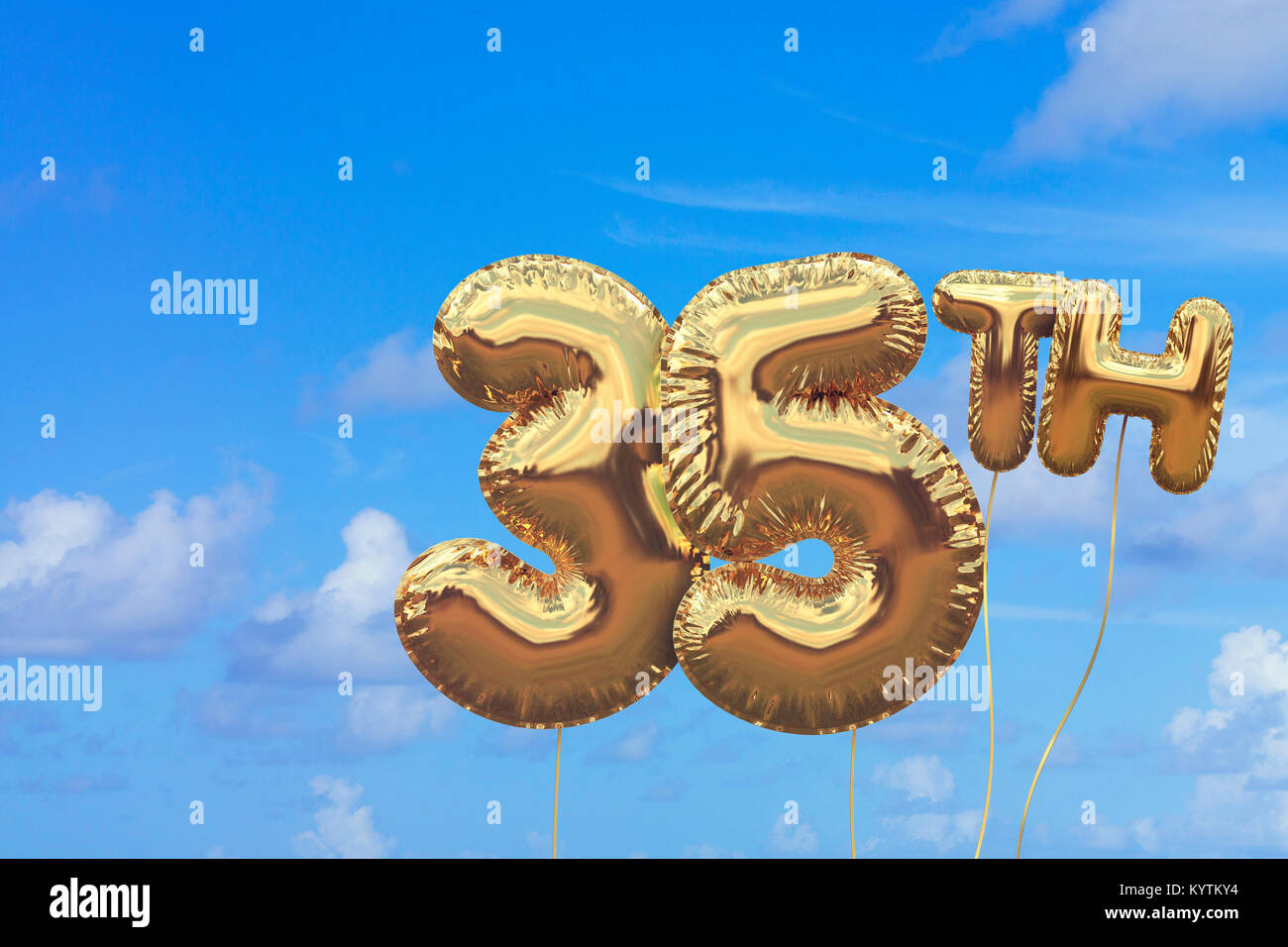 Gold number 35 foil birthday balloon against a bright blue summer sky ...