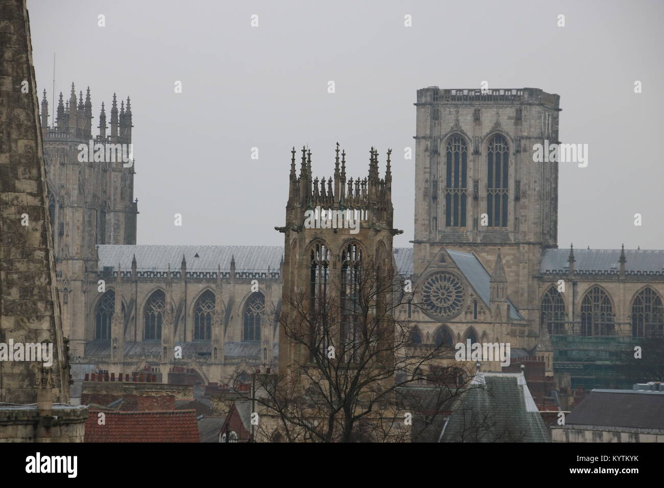 Historic York Minster towers above the roof tops of buildings in the ...