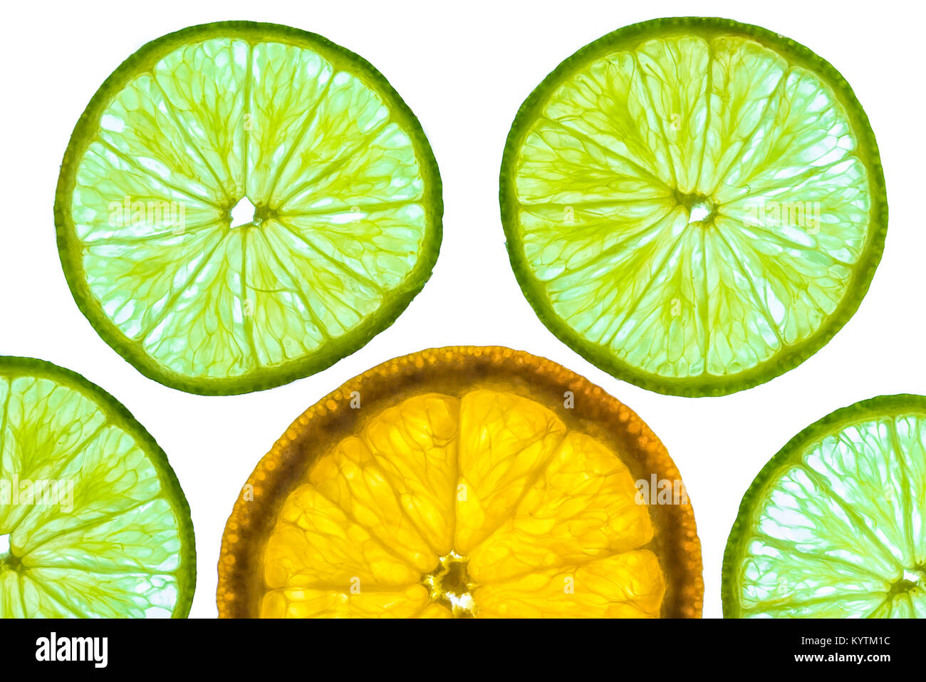Thin translucent slices of orange and lime isolated on white background ...