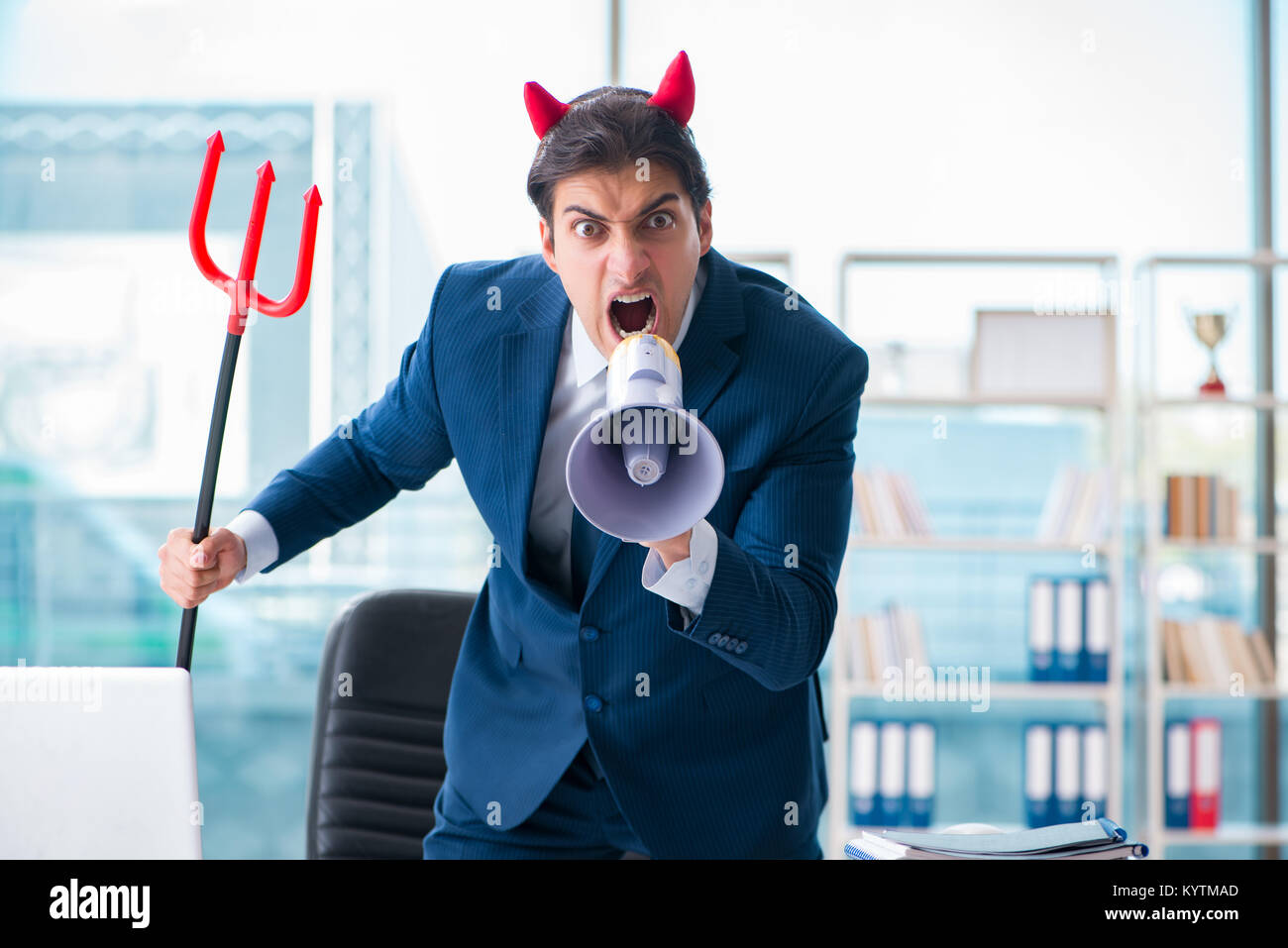 Devil angry businessman in the office Stock Photo - Alamy