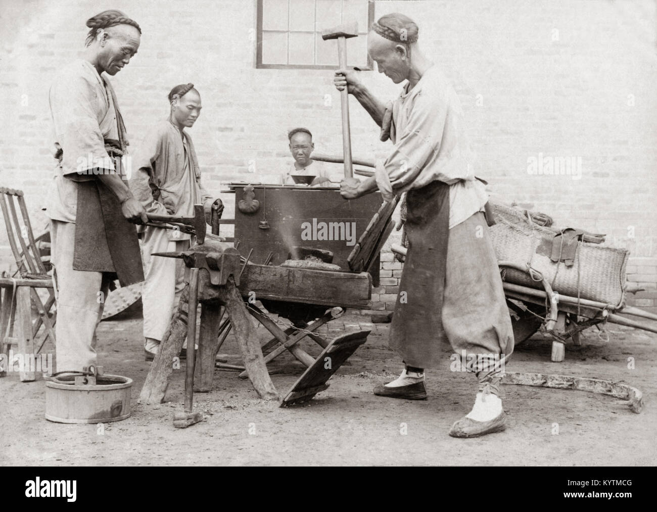 Chinese blacksmiths, c.1900 Stock Photo - Alamy