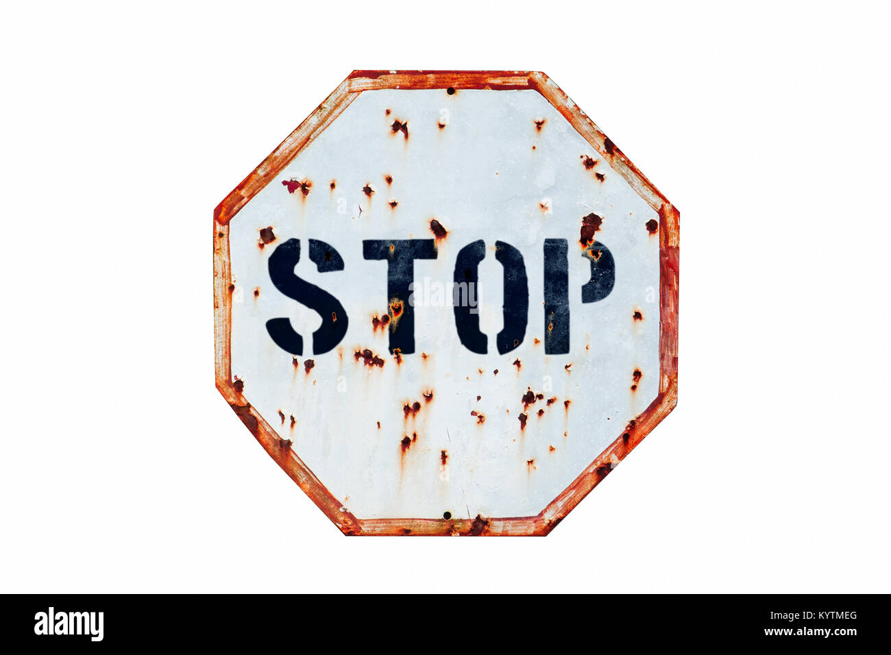 Stop written in bold letters in a rusty and grungy white and red old ...