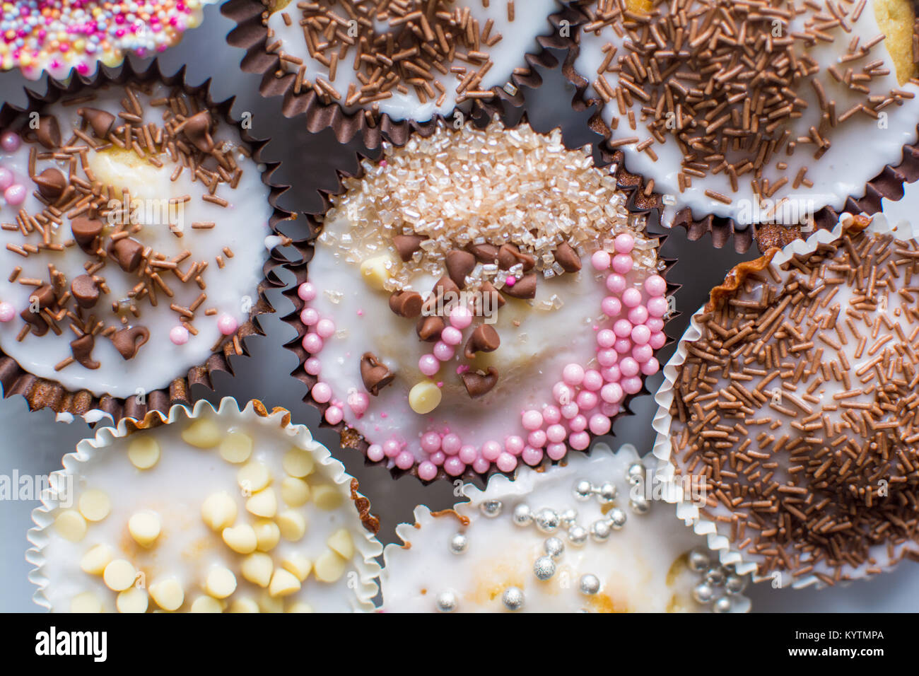 Home made cupcakes baked and decorated by kids Stock Photo - Alamy