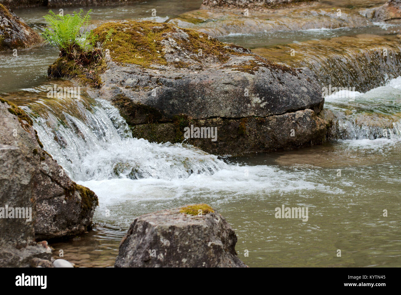 Cascading water in summer Stock Photo - Alamy