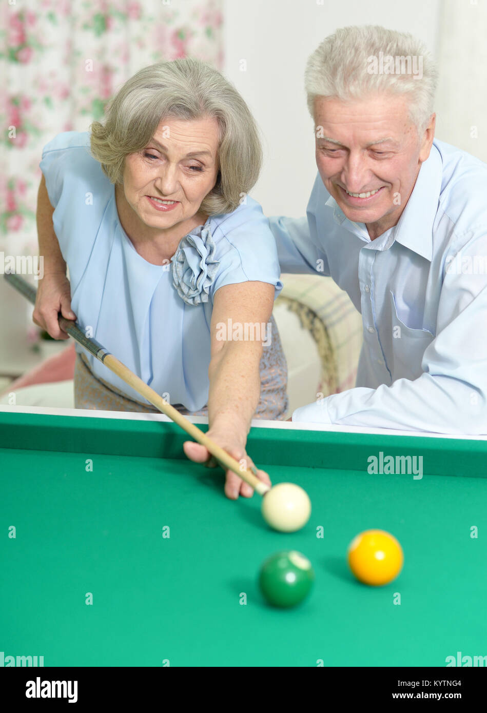Mature woman playing billiard hi-res stock photography and images - Alamy