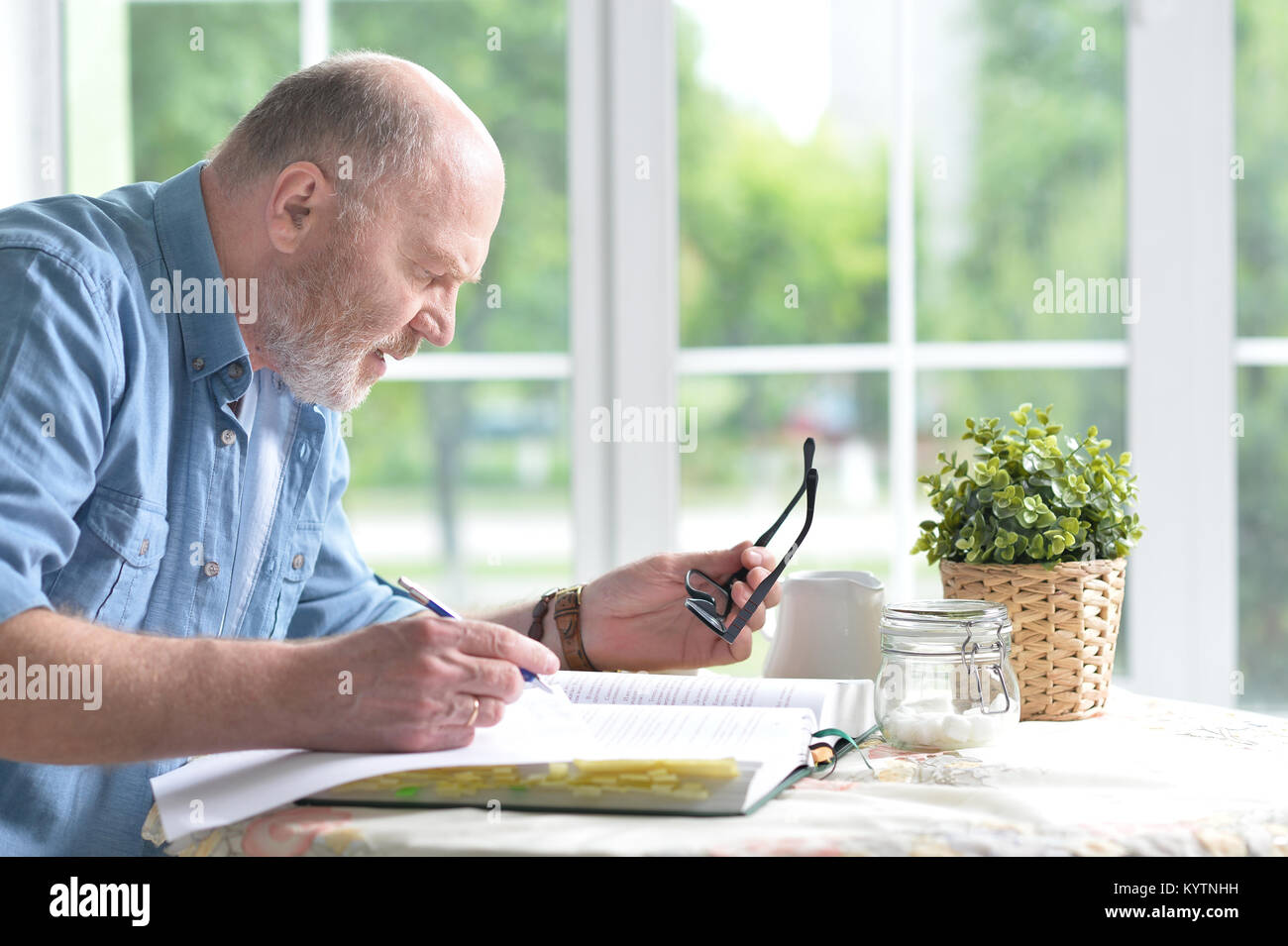 happy man with book Stock Photo - Alamy