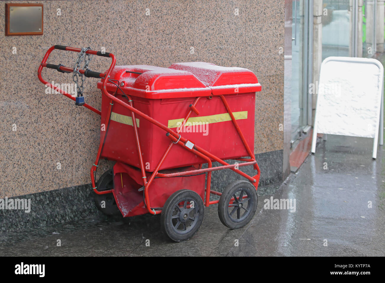 Postman Mail Delivery Cart at Snow in London Stock Photo - Alamy