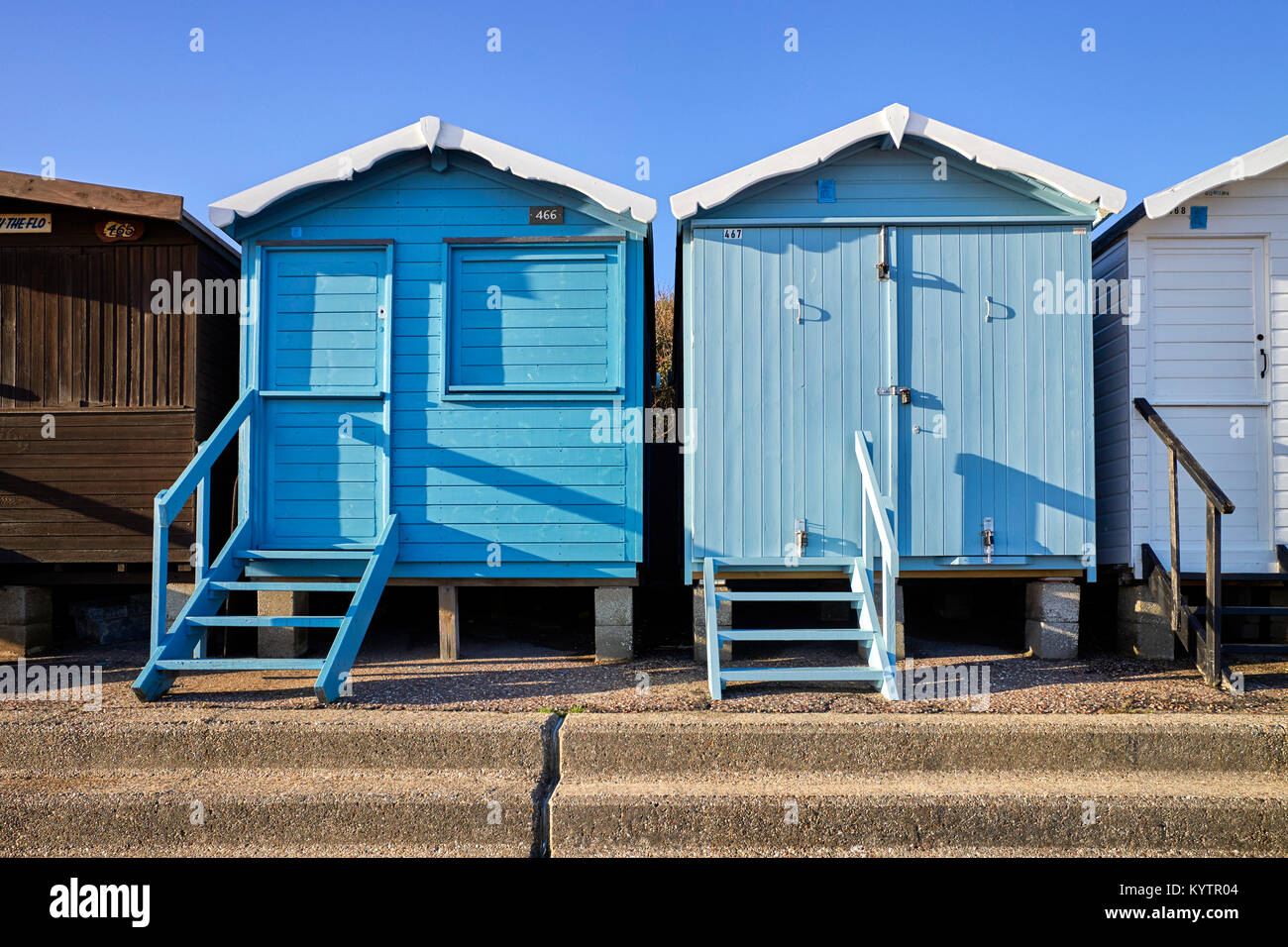 Two blue beach huts at Frinton on Sea, Essex Stock Photo - Alamy