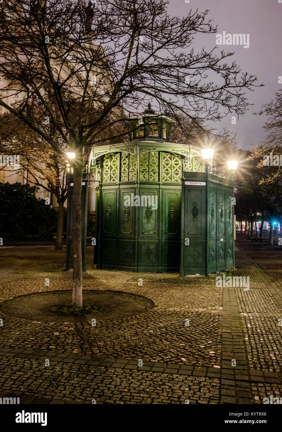 A very rare Pissoir in Berlin illuminated at night. December 2017 Stock ...
