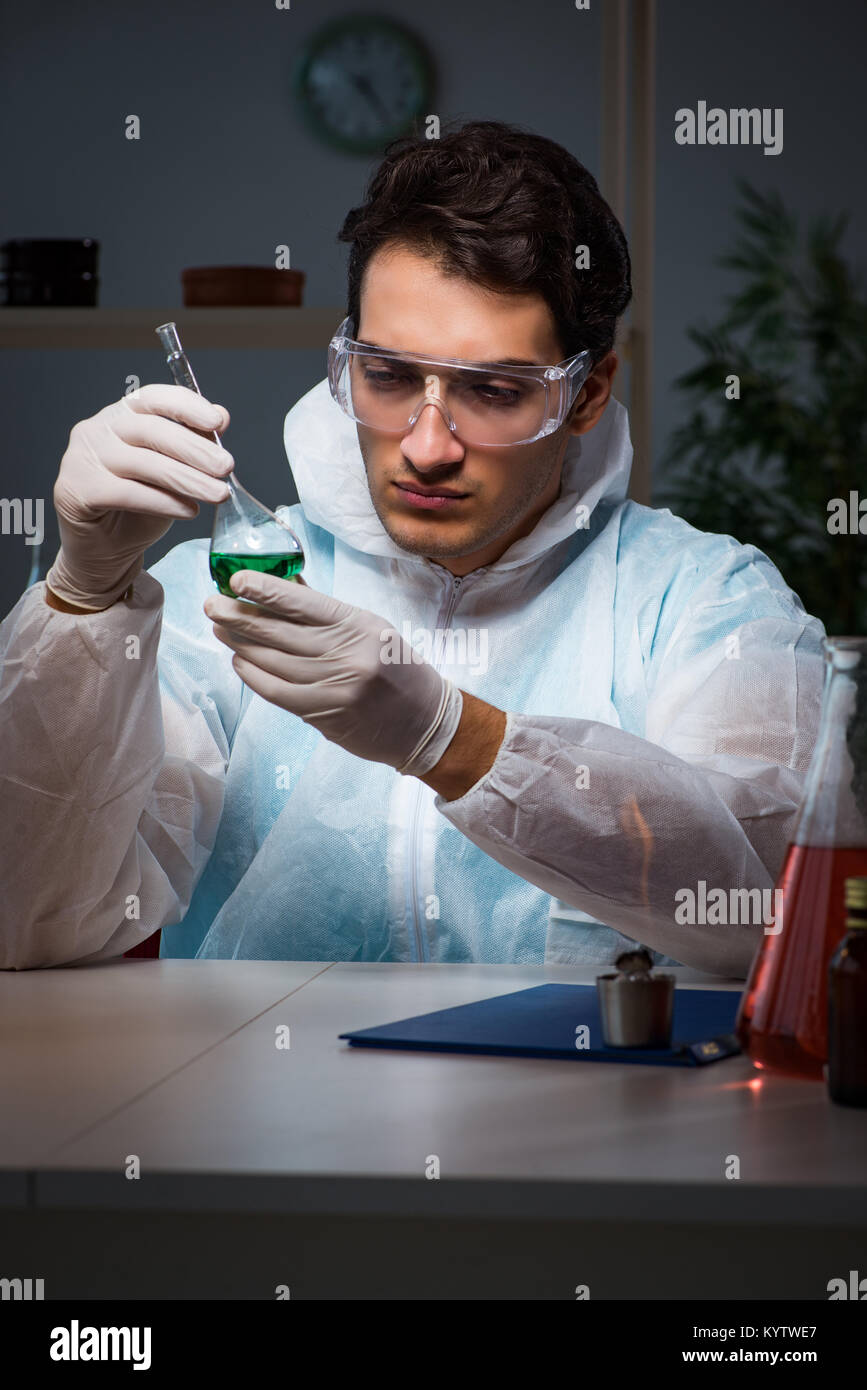 Forensic investigator collecting blood hi-res stock photography and ...