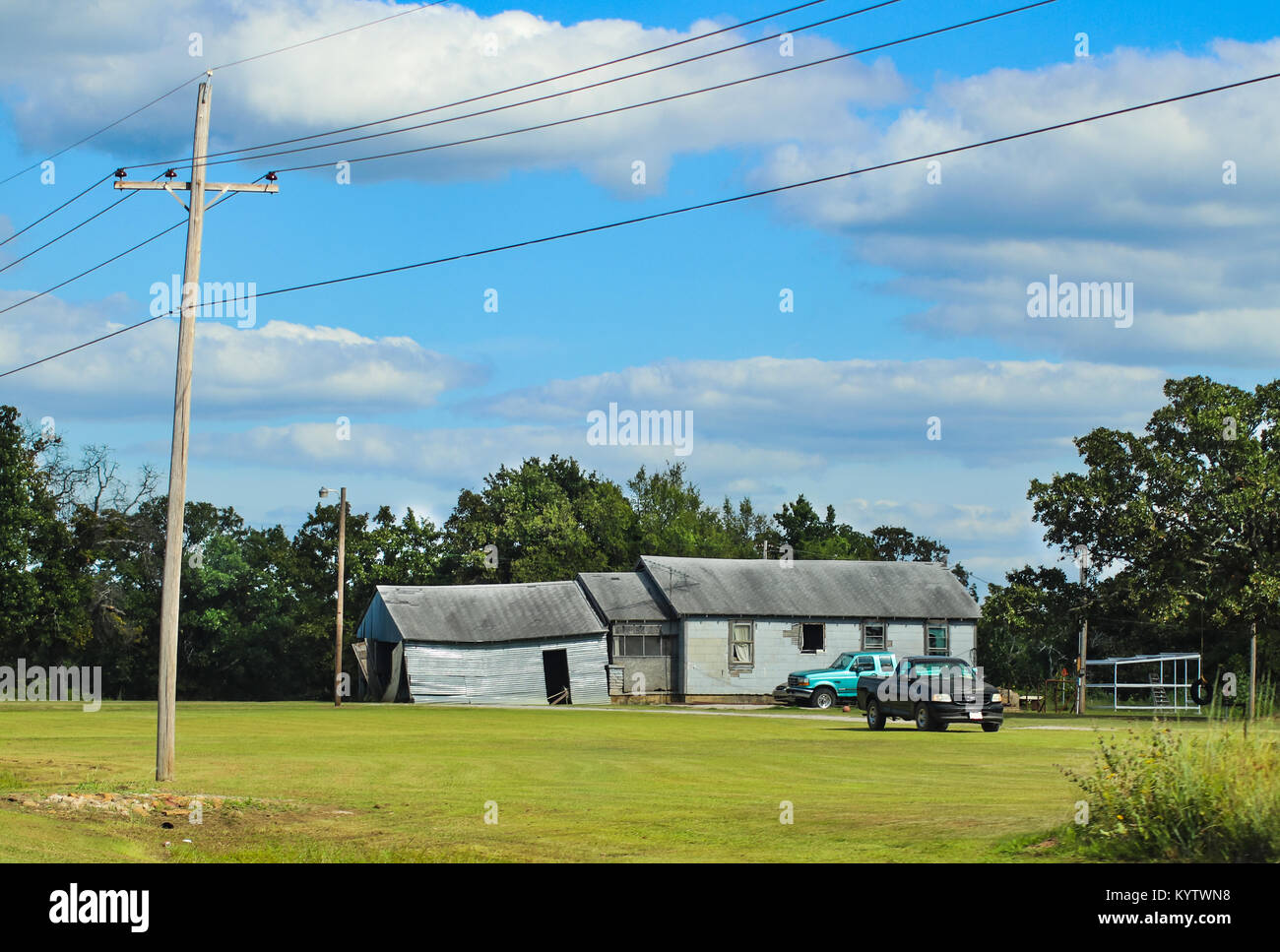 Abandoned derilict house with windows missing in rural America with two ...