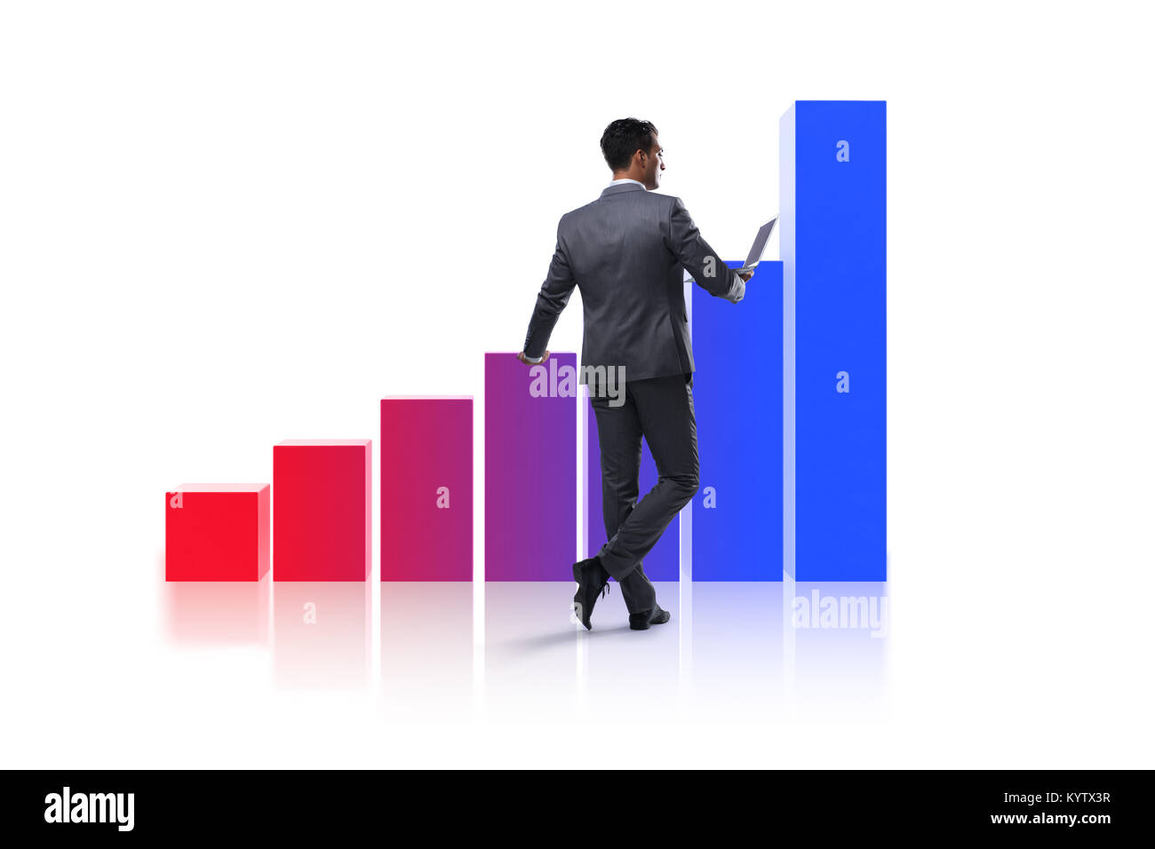 Businessman standing next to bar chart on white background Stock Photo ...