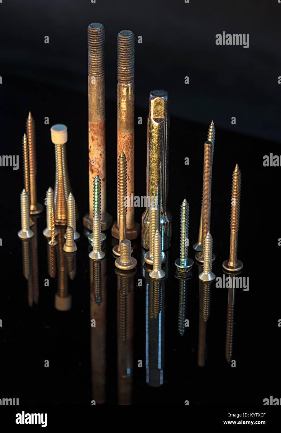 Row of odd screws hi-res stock photography and images - Alamy