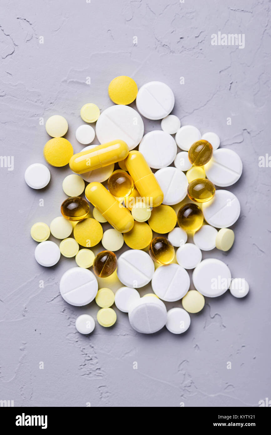 Different pills, tablets and capsules. Assorted of medicines. Top view ...
