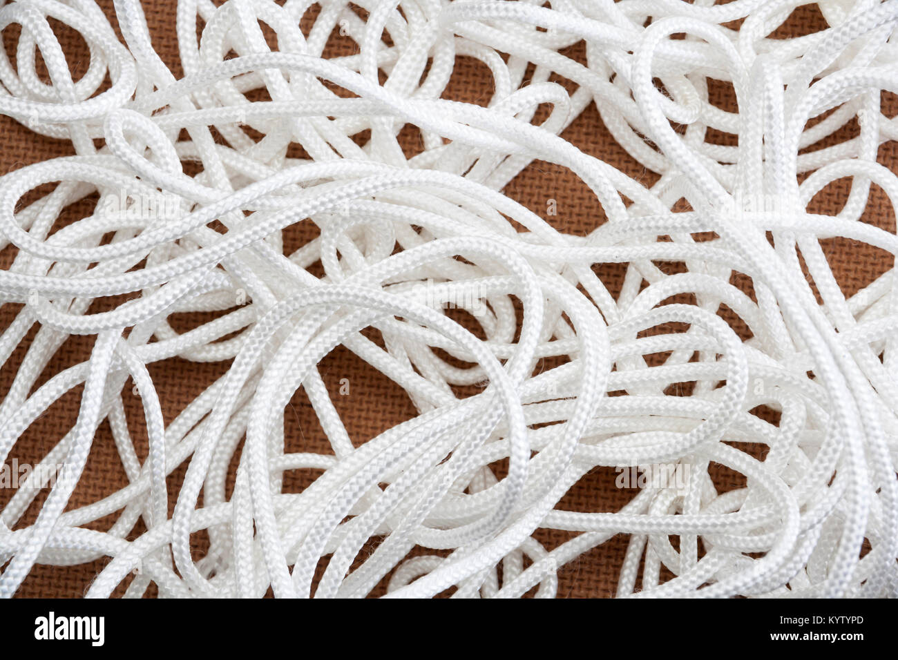 Tangled nylon string full frame background Stock Photo - Alamy